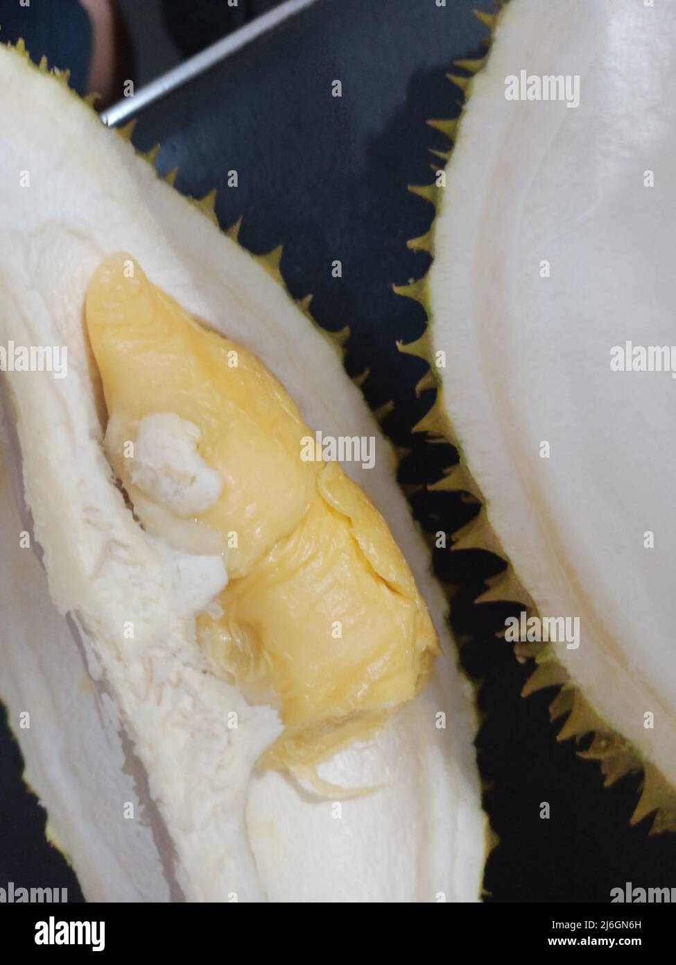 Opened durian Malaysian fruit Stock Photo - Alamy