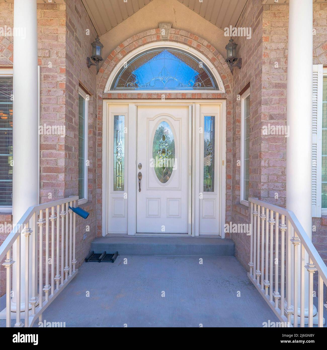 Square Huge single white front door with ornate glass panels and arched ...