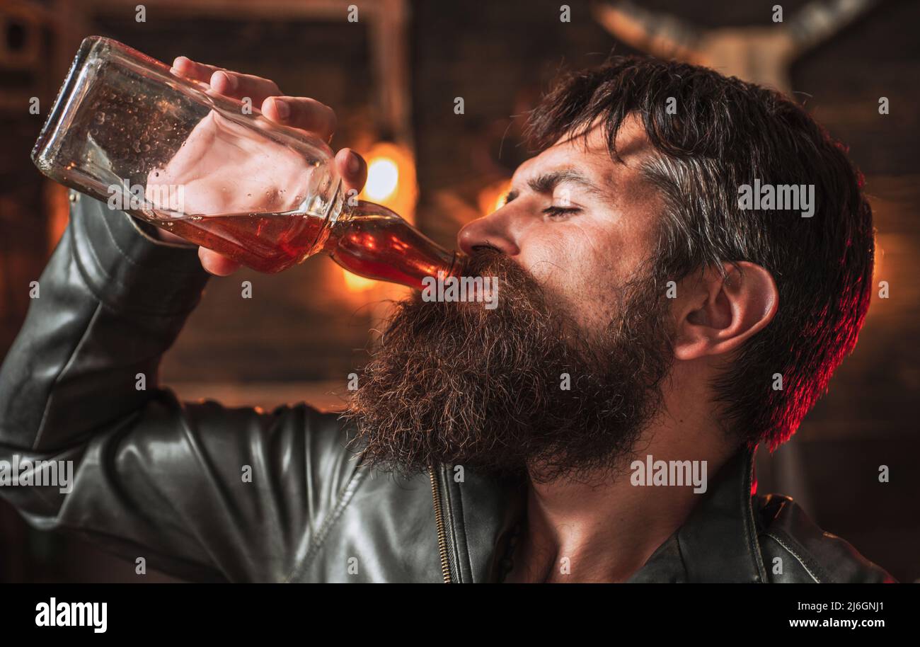 Man drinking alcohol. Whisky, brandy or cognac concept. Serious sad man ...