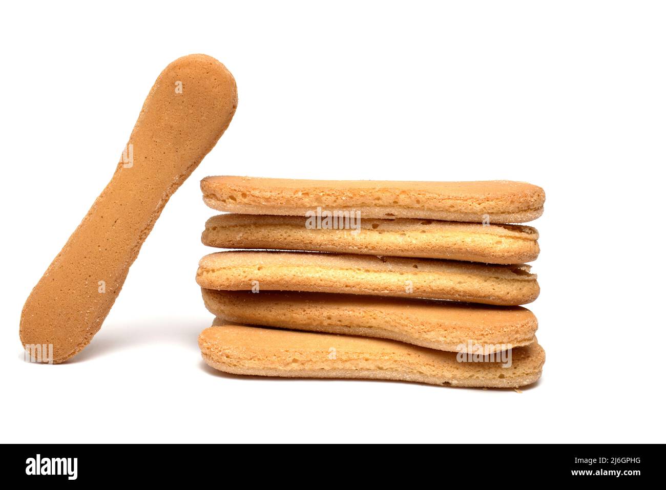 Close up of a stack of golden brown biscuits spoon biscuit biscotti and ...