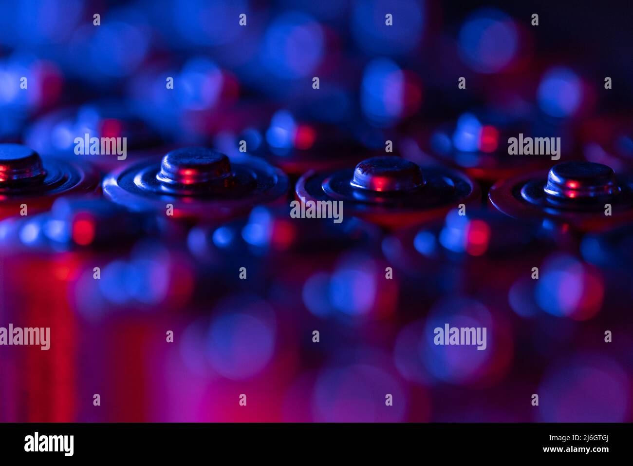 Closeup of positive ends of discharged batteries AA sizes, macro shot ...