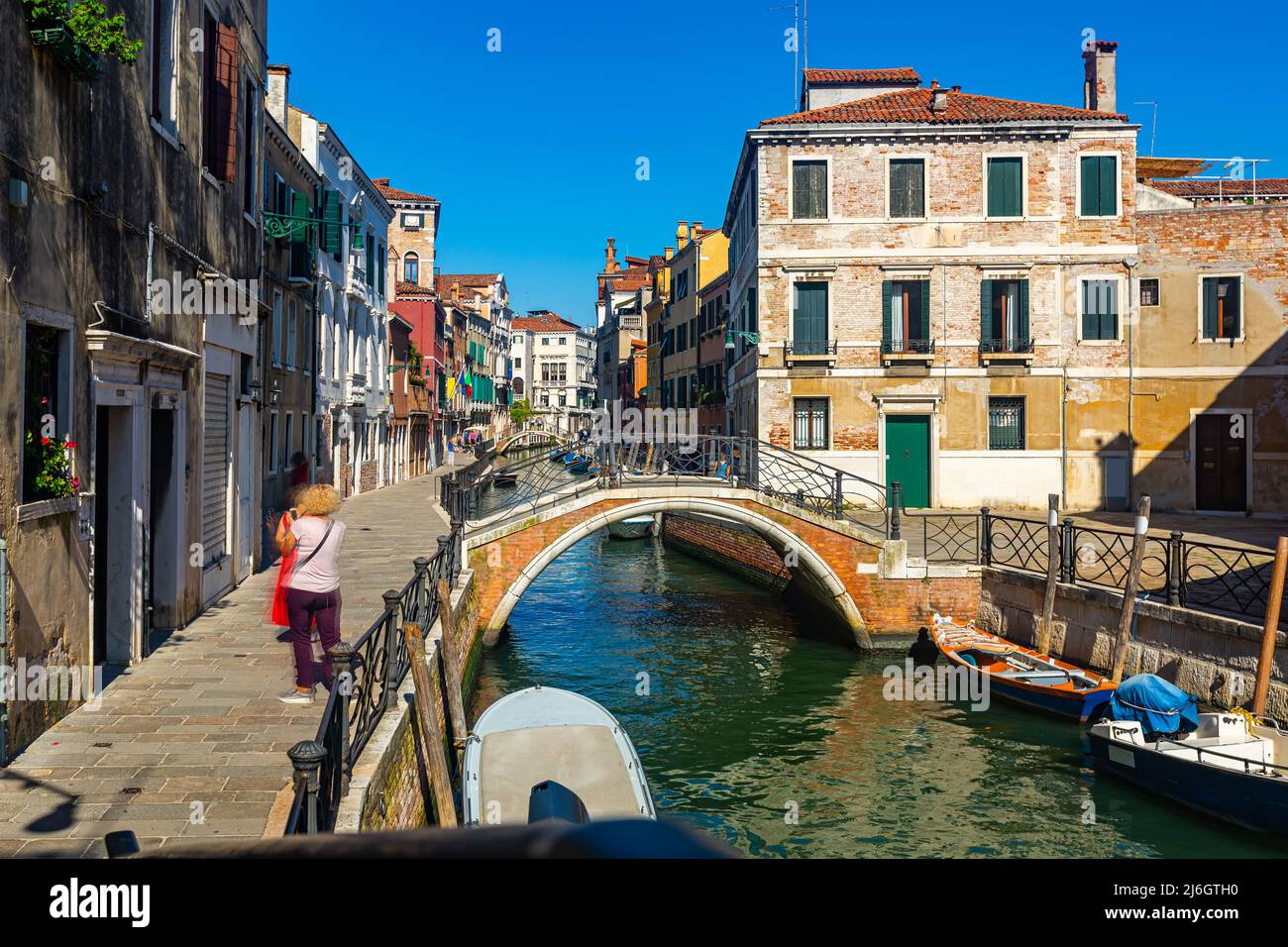 Venice with colorful buildings and canals, popular destination of Italy ...