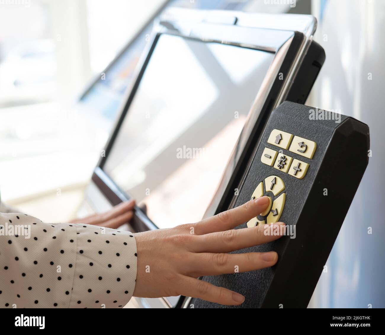 A woman uses a voting device for blind and visually impaired citizens ...