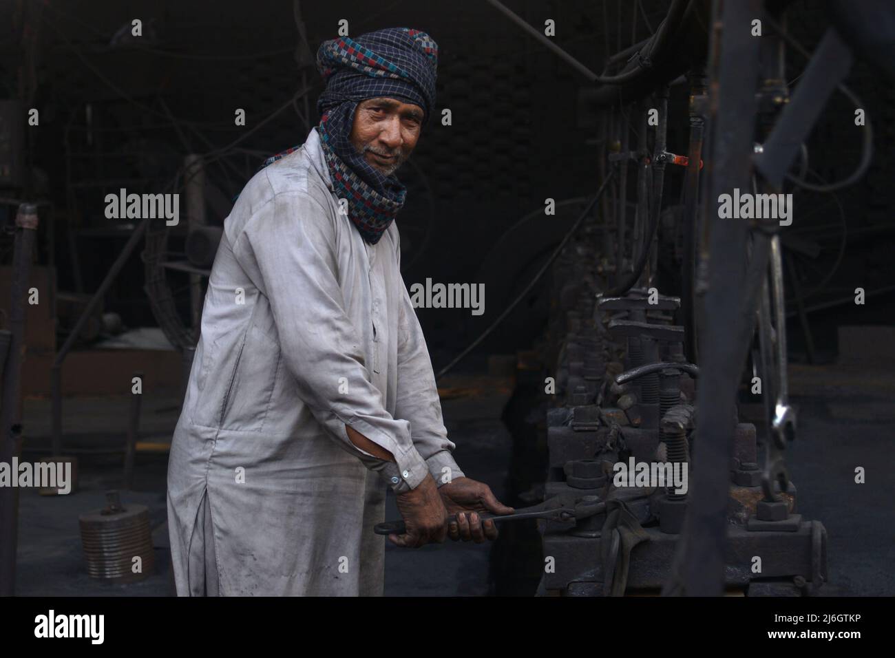 May 1, 2022, Lahore, Punjab, Pakistan: Pakistani laborers work at an ...