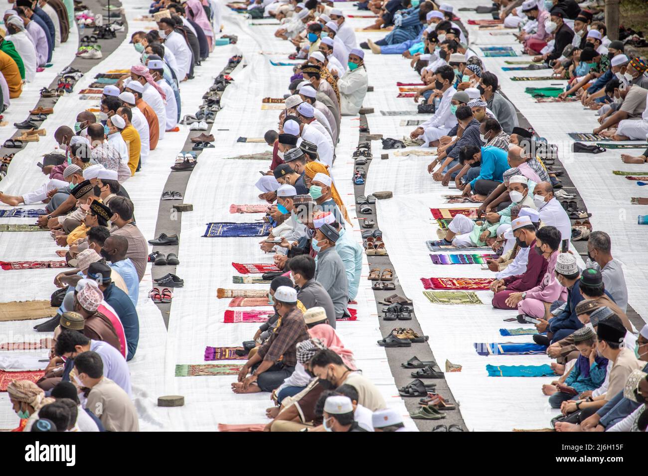 Muslims men perform Eid al-Fitr prayers at the Foundation of the ...