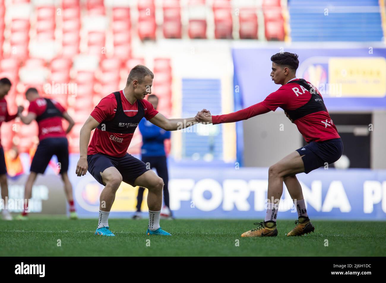 Patryk Kun (L) and Ben Lederman (R) of Rakow in action during the ...