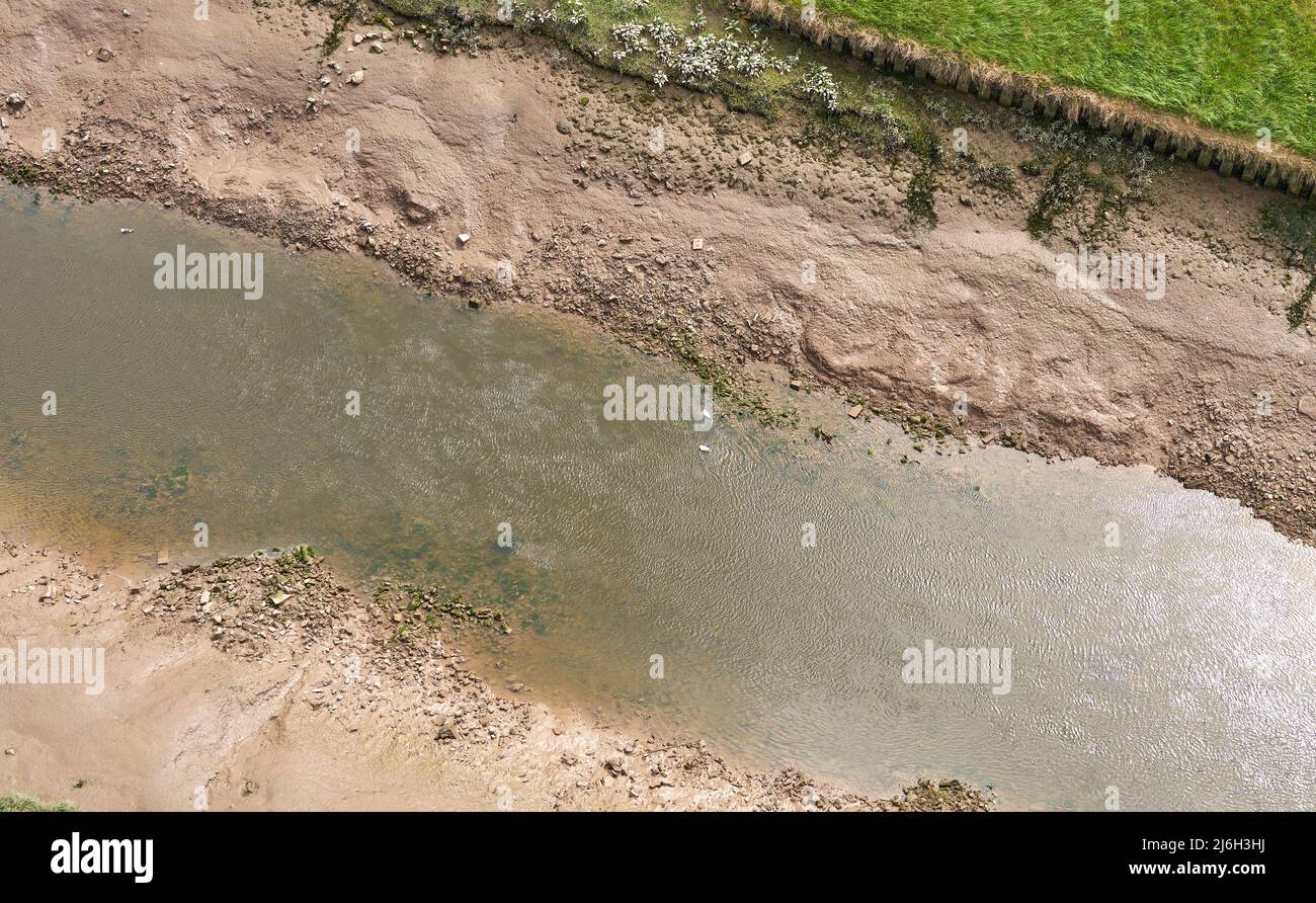 Tidal river at low tide image Stock Photo - Alamy