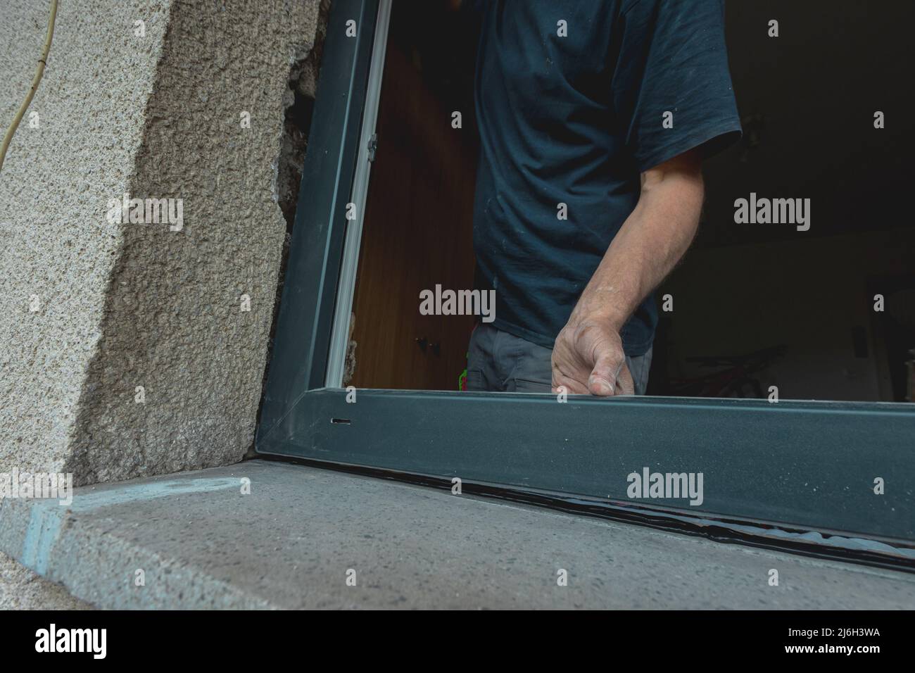 Installing modern windows onto old window ledge or shelf. Window frame ...