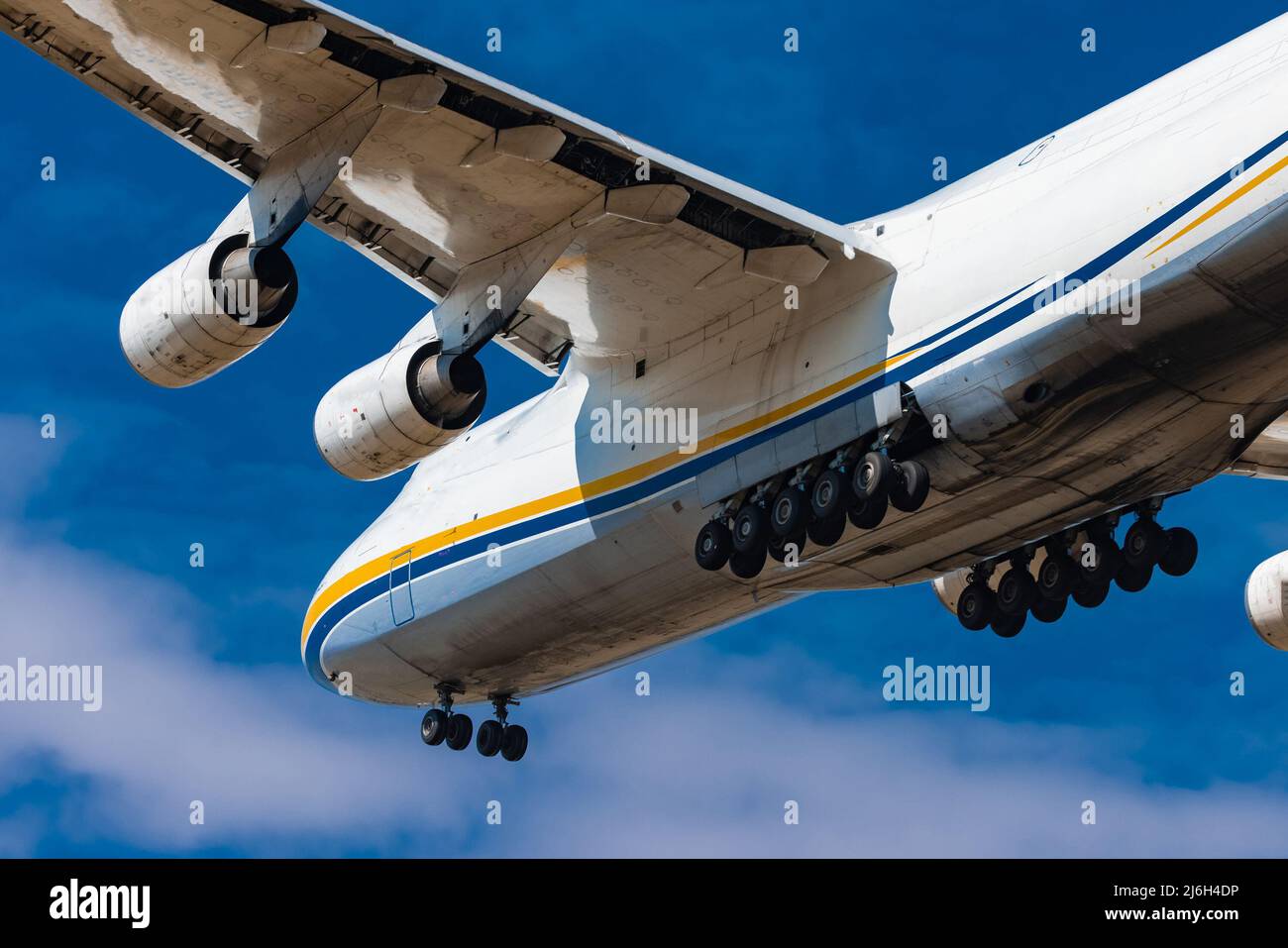 Huge cargo plane is approaching the runway and is about to land on an ...