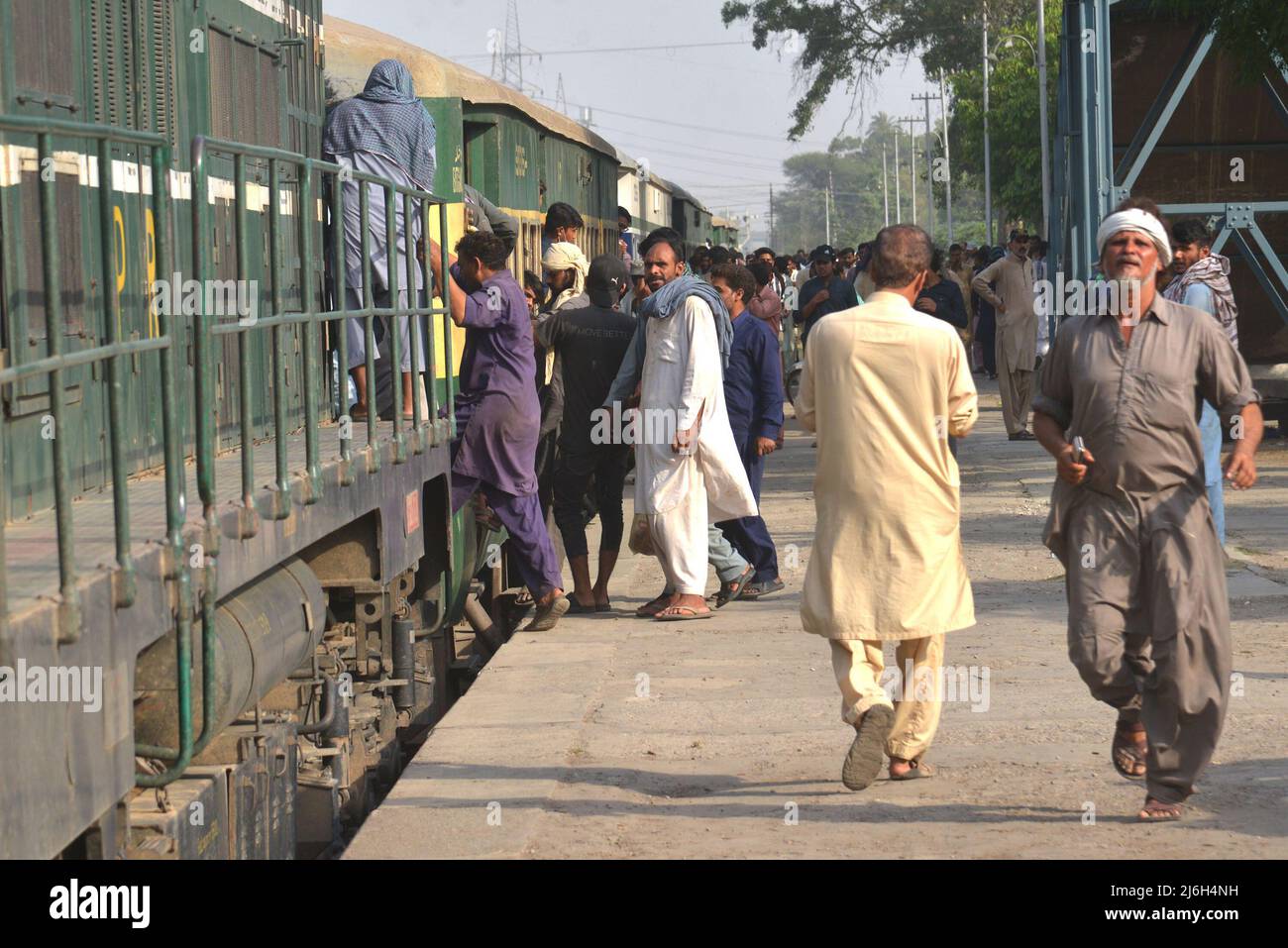 April 30, 2022, Lahore, Punjab, Pakistan: Pakistani people ride on a ...