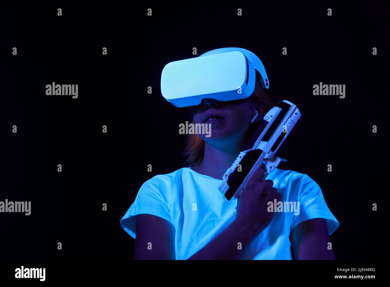 Woman with virtual reality headset is playing game. Concept of virtual ...