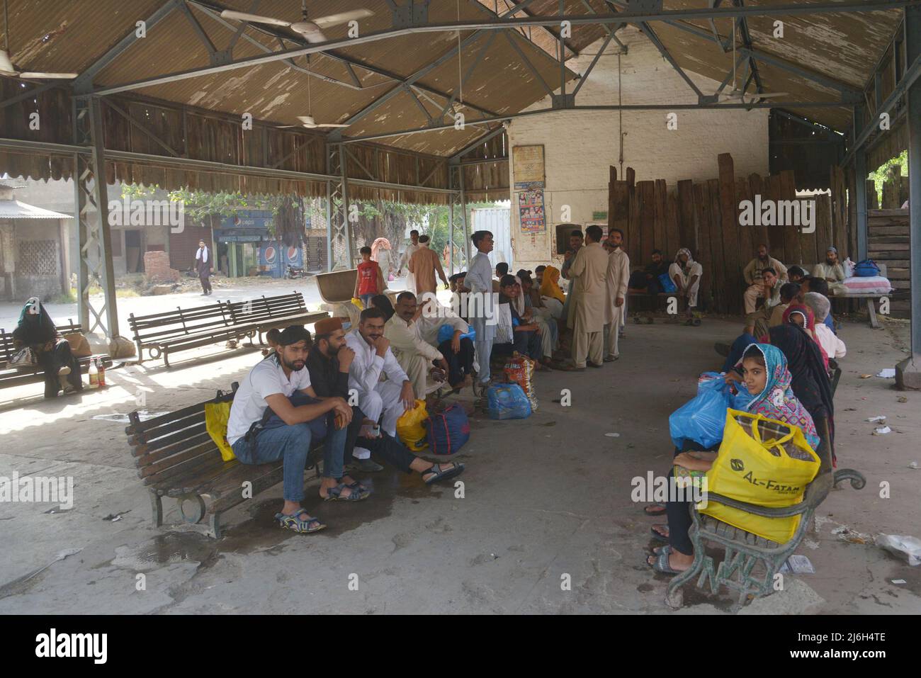 April 30, 2022, Lahore, Punjab, Pakistan: Pakistani people ride on a ...