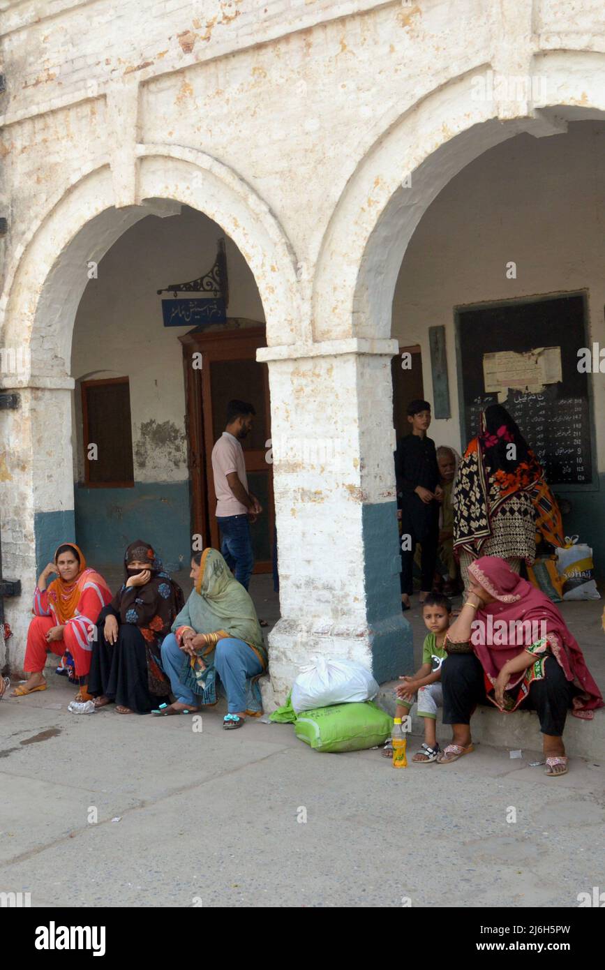 April 30, 2022, Lahore, Punjab, Pakistan: Pakistani people ride on a ...