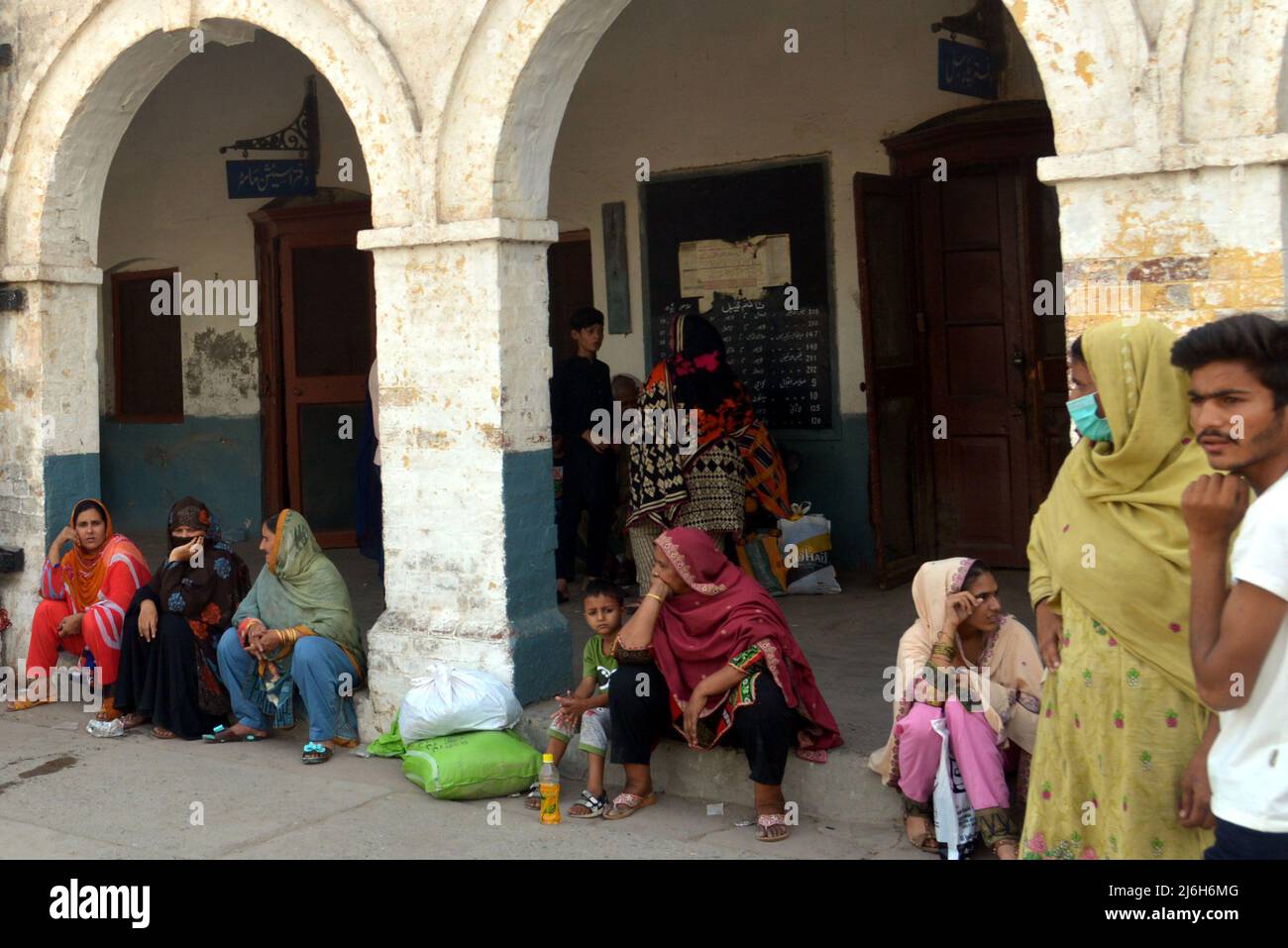 April 30, 2022, Lahore, Punjab, Pakistan: Pakistani people ride on a ...