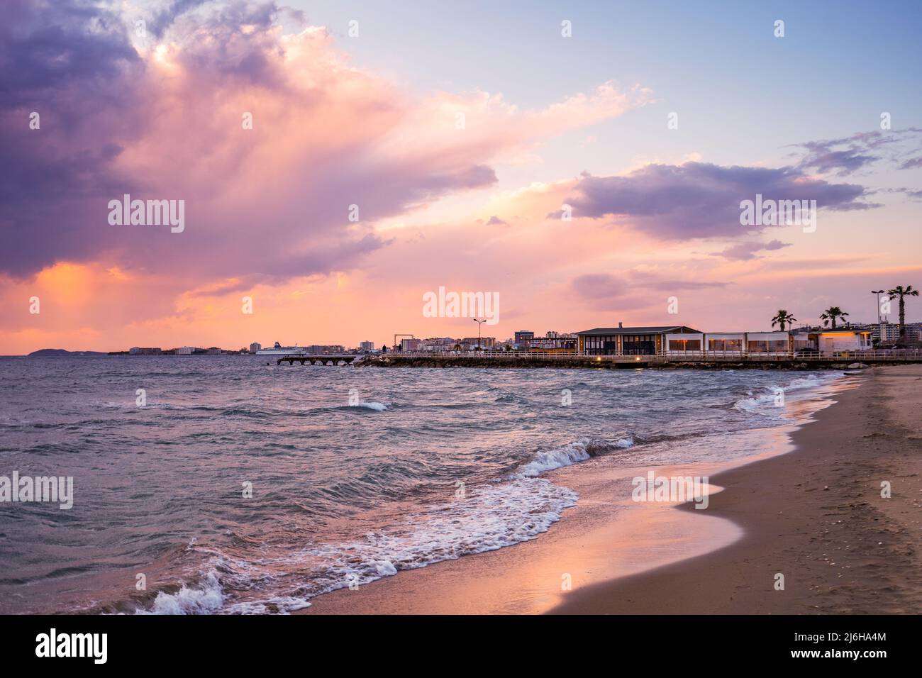 cafe by the sea. restaurant on the beach at sunset Stock Photo - Alamy
