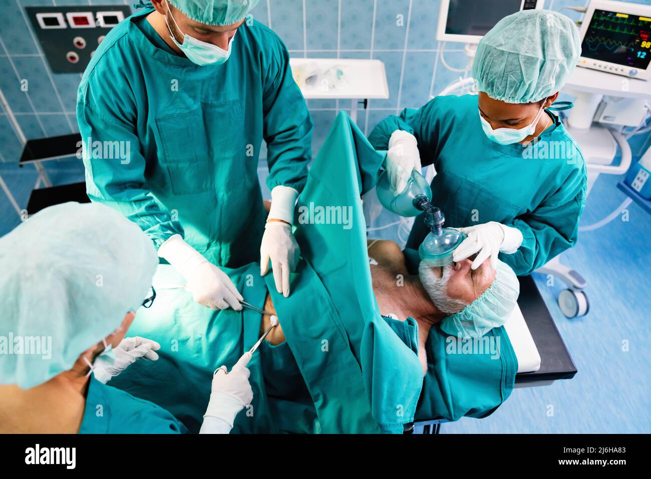 Group of surgeon at work in operating room in hospital Stock Photo - Alamy