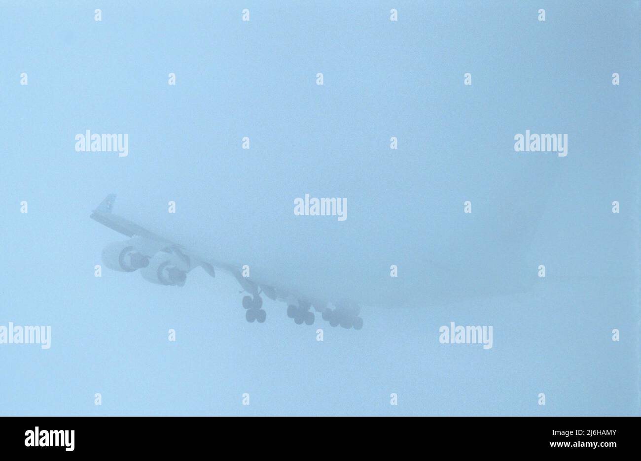 Amsterdam, circa january 2005. Telephoto shot of a jet aircraft taking ...