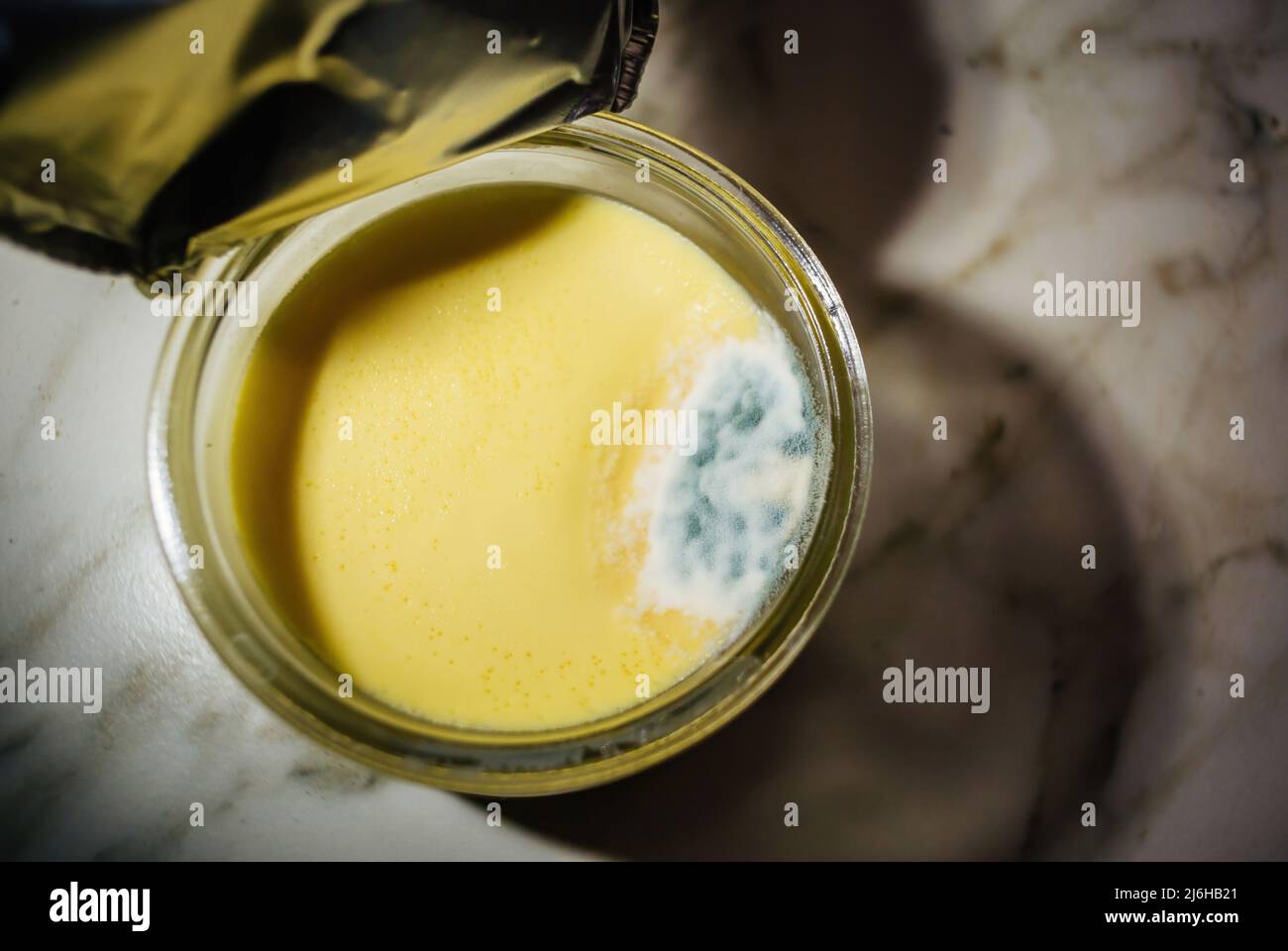 Open creme brulee package with mold inside - fast Perishable food Stock ...