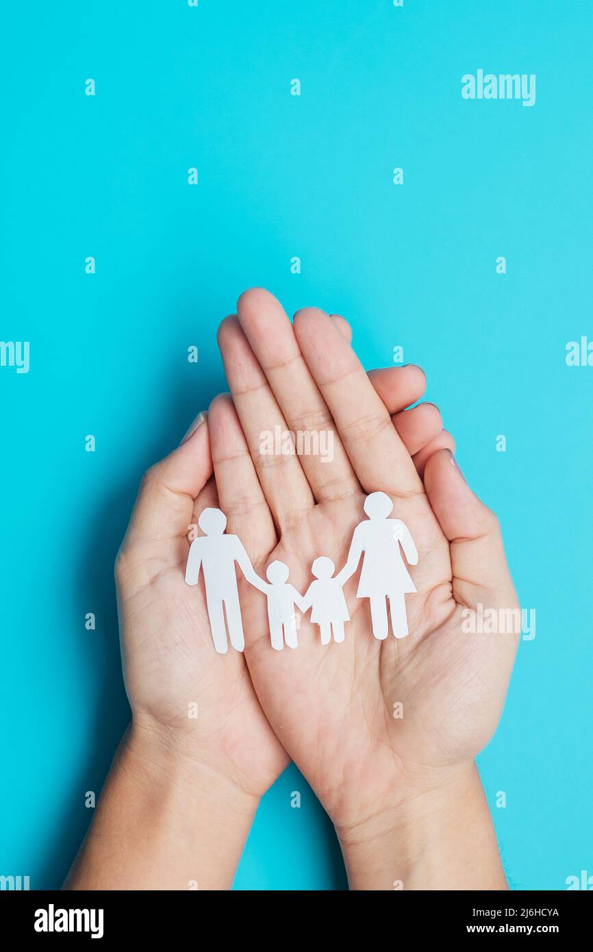 Happy Family day. hands holding paper shape cutout with Father, Mother ...
