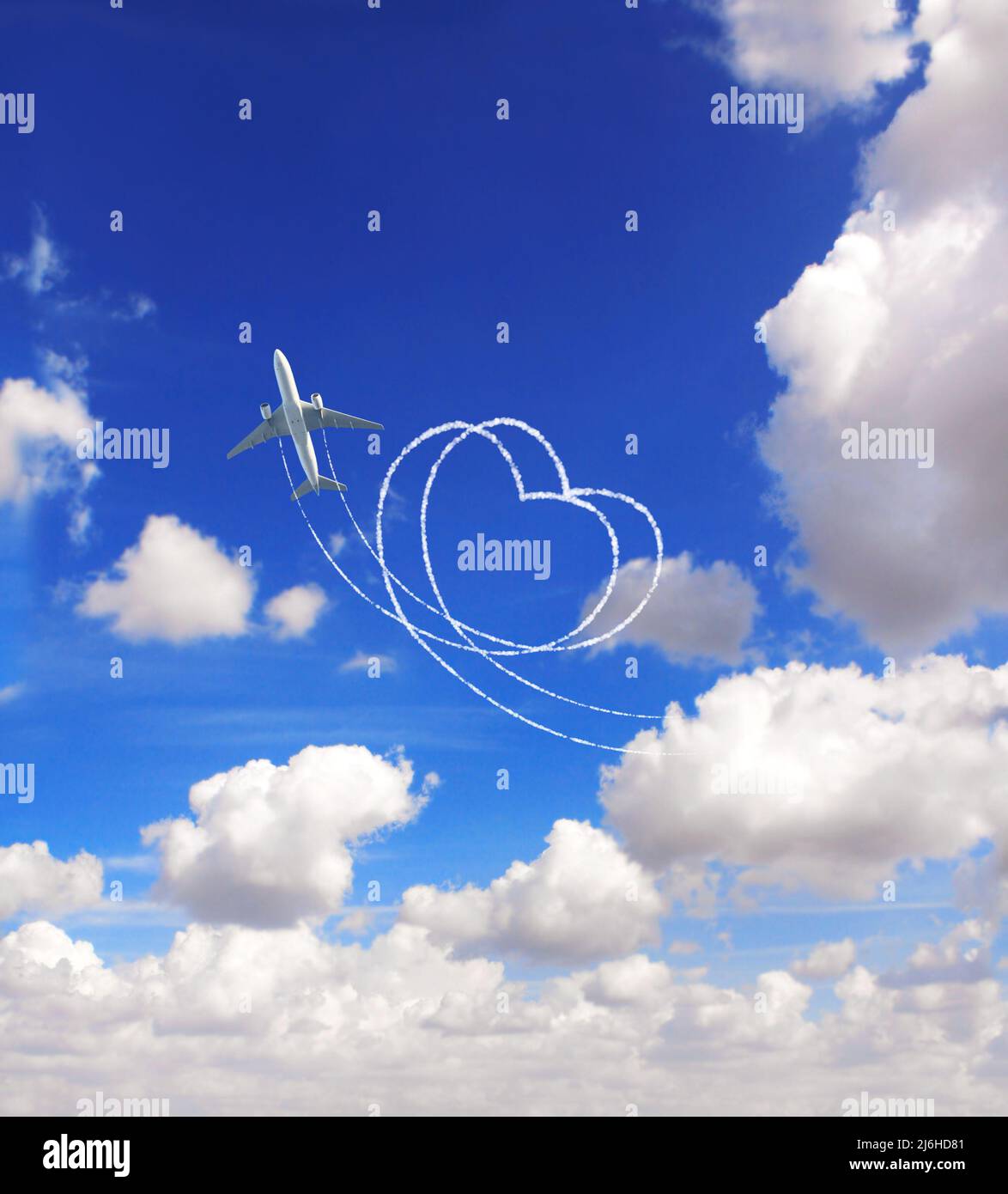 Vertical nature background with aircraft draw a heart in the sky ...