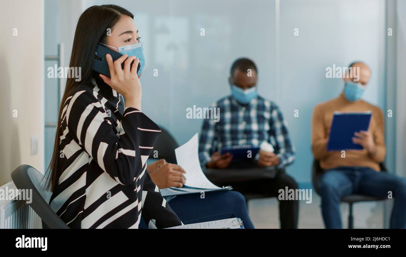 Office asian woman serious interview hi-res stock photography and ...