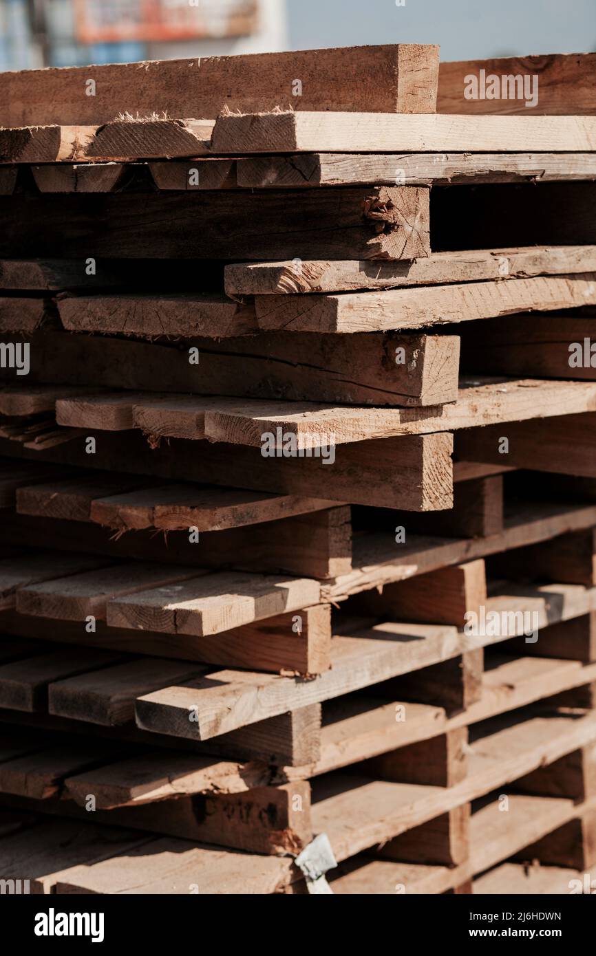 Old wooden pallets in factory warehouse Stock Photo - Alamy