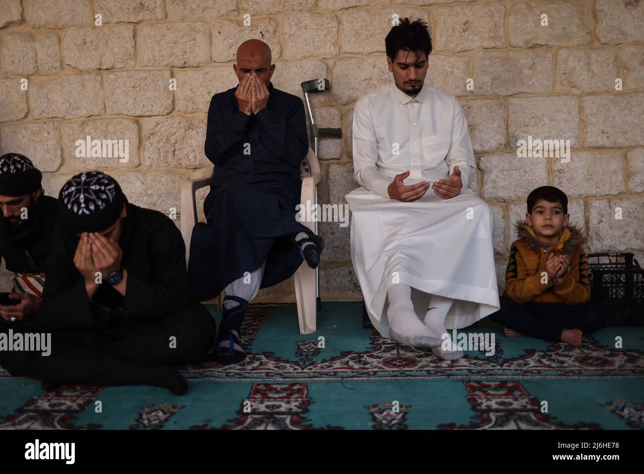 02 May 2022, Syria, Idlib: Syrian Muslims perform Eid al-Fitr prayer at ...