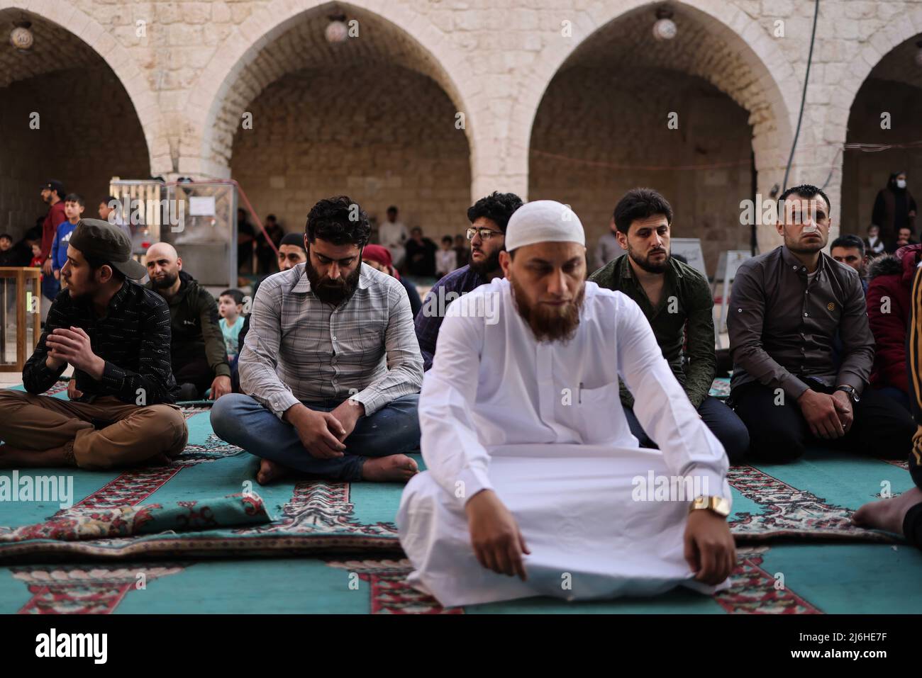 02 May 2022, Syria, Idlib: Syrian Muslims perform Eid al-Fitr prayer at ...