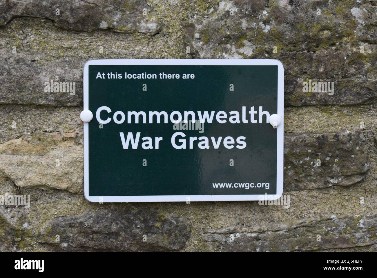 Sign: "Commonwealth War Graves" at St Andrews Church in Great Linford ...