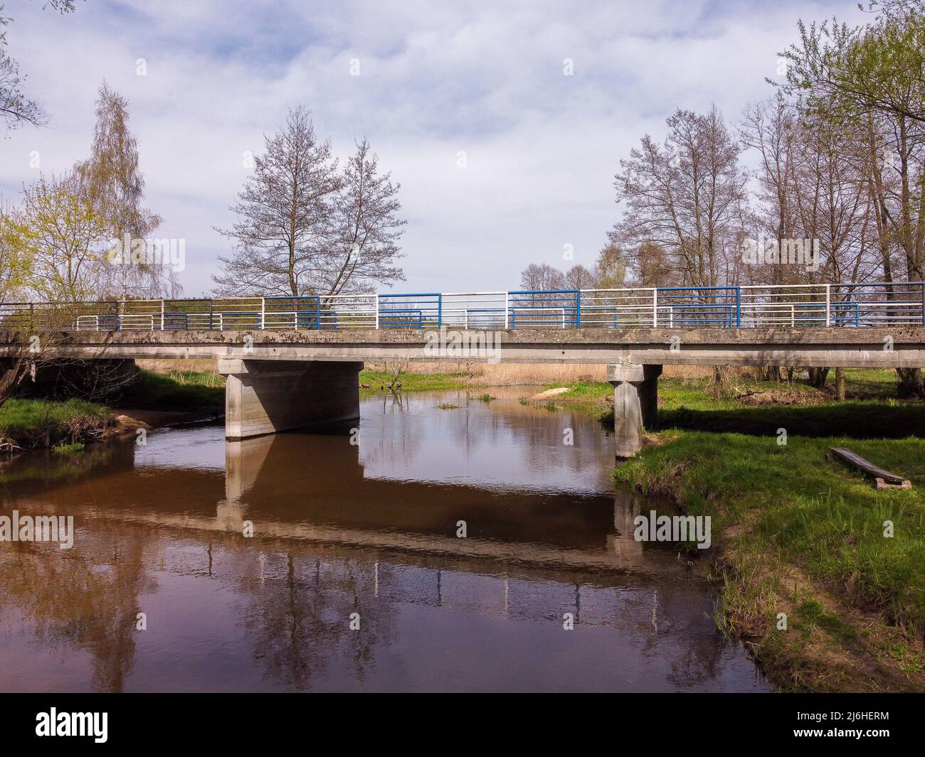 Road bridge over a small river Stock Photo - Alamy