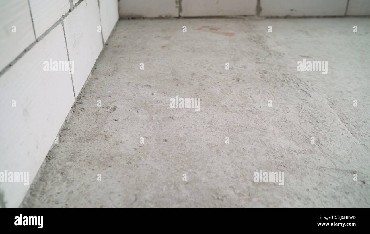 Concrete floors in a new building. Block walls and concrete floors ...