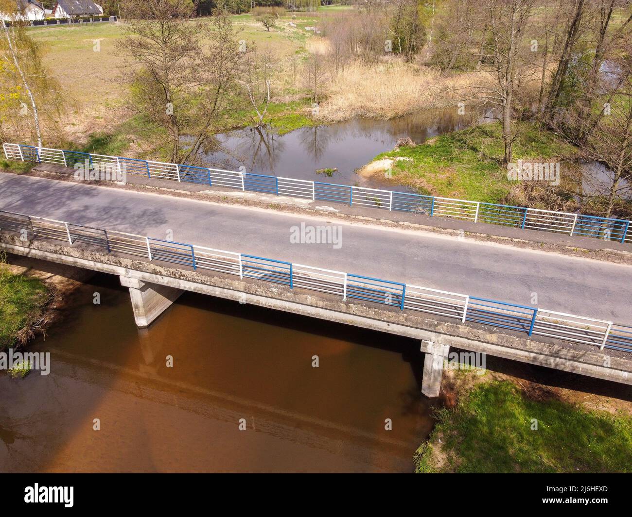 Road bridge over a small river Stock Photo - Alamy
