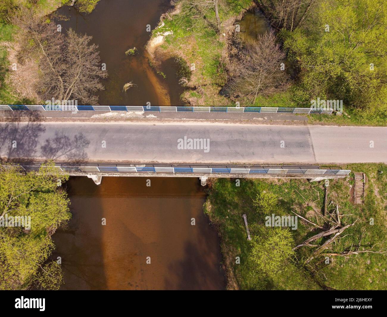 Road bridge over a small river Stock Photo - Alamy