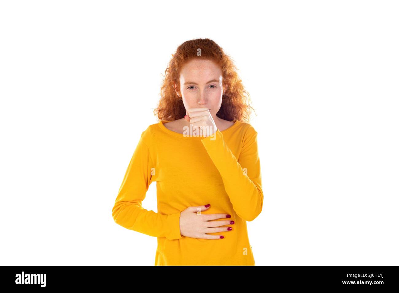Seasonal flu. Cute redhead female student cought cold, wear sweater and ...