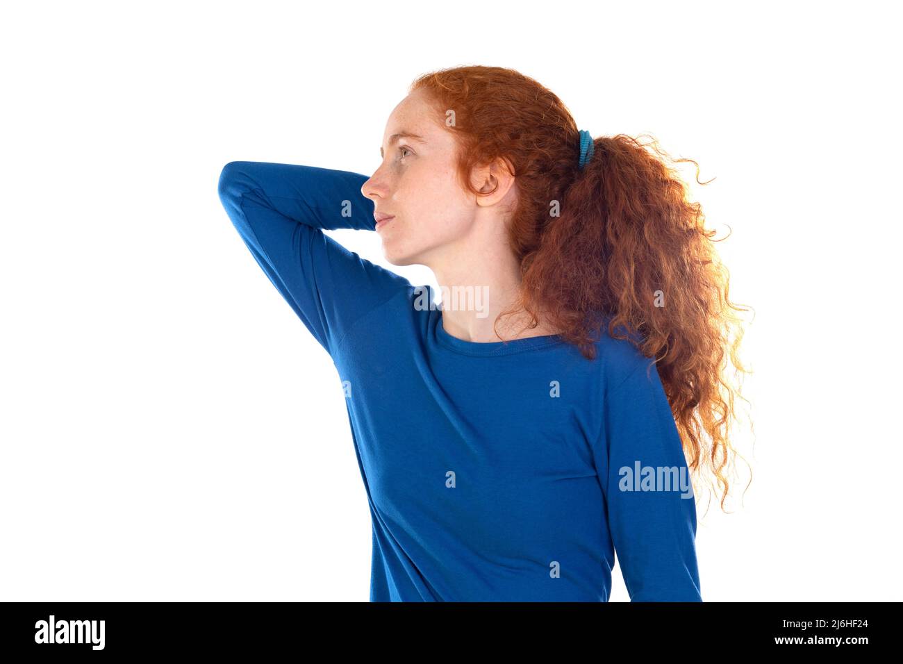 Sad red-haired girl isolated on a white background Stock Photo - Alamy