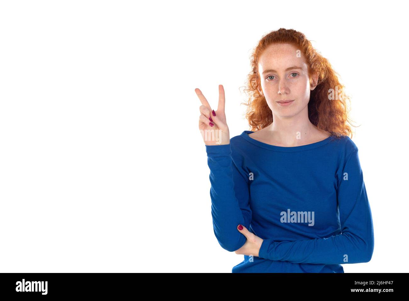 Portrait of attractive successful red-haired girl rejoicing having fun ...