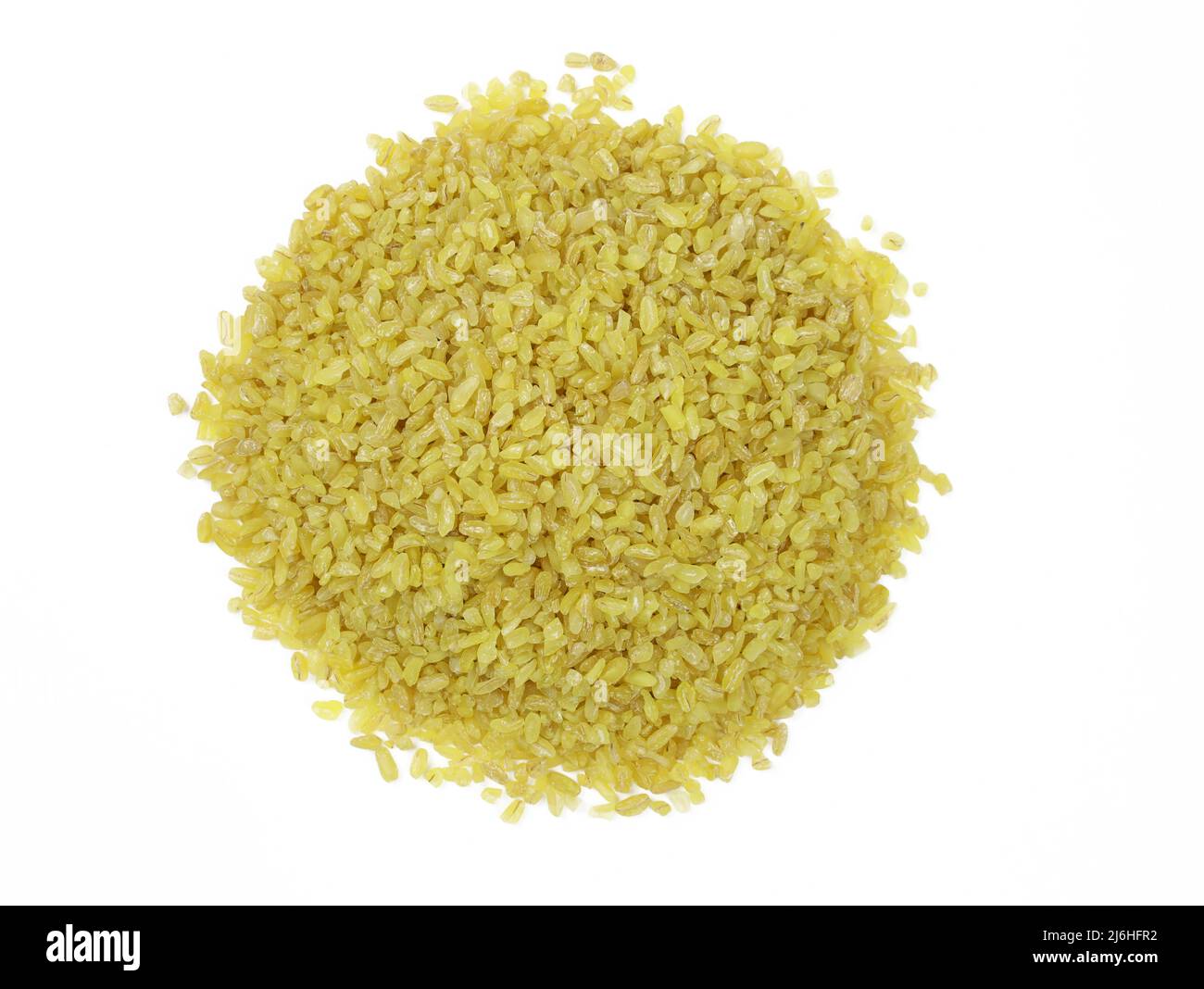 Bulgur groats from crushed wheat close-up. Pile of Bulgur on white ...