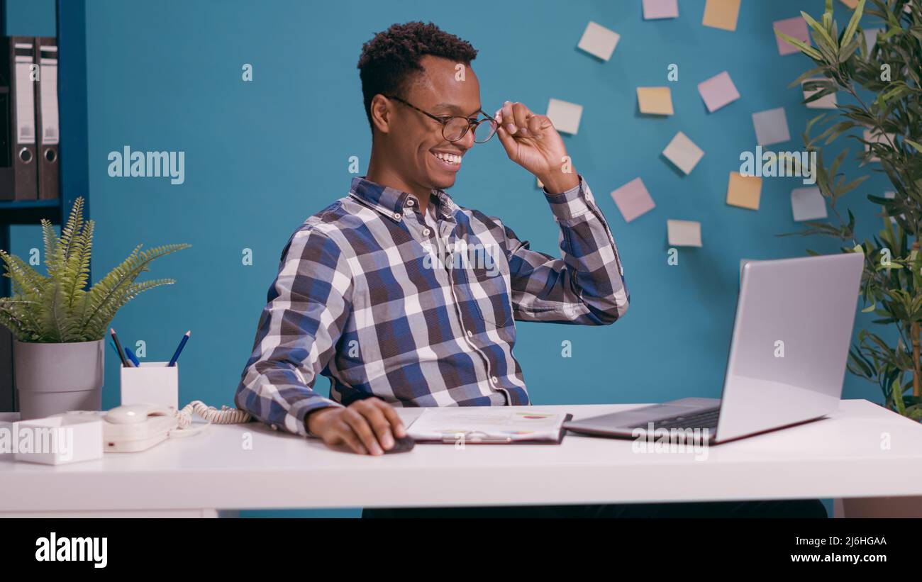 Cheerful person celebrating business success and accomplishment ...