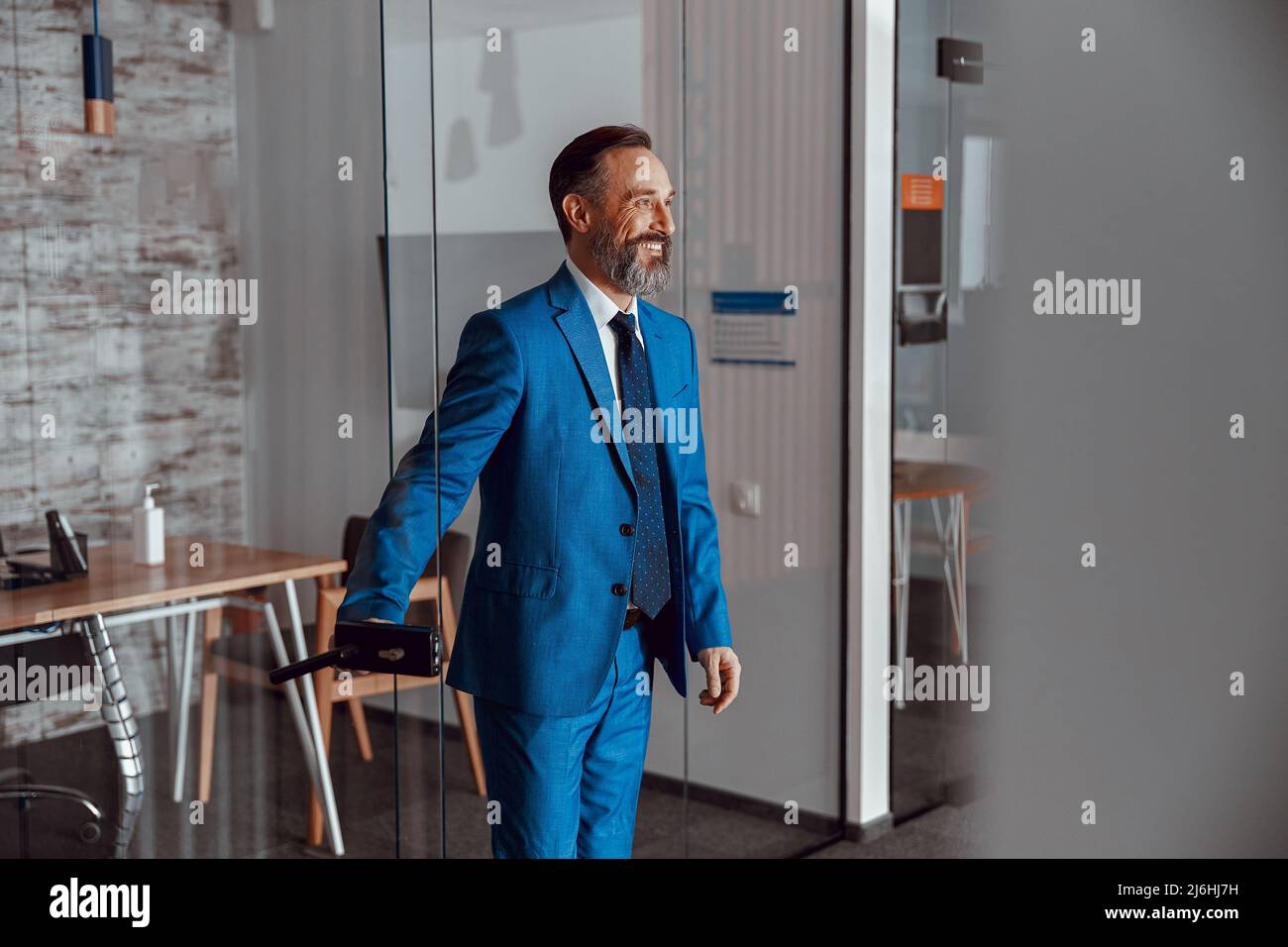 Man entering office hi-res stock photography and images - Alamy
