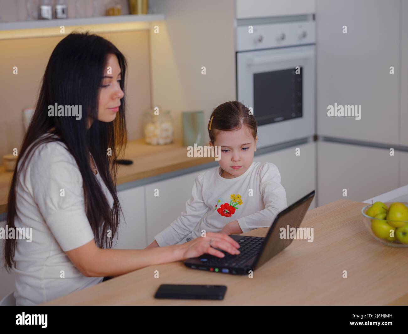 Parent children laptop working stress hi-res stock photography and ...