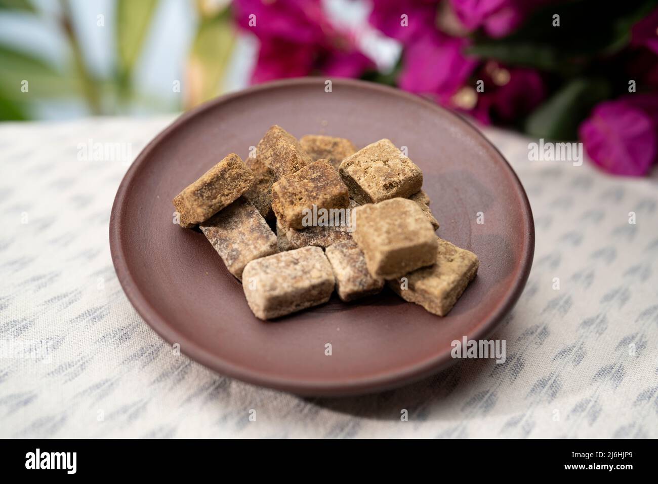 A selection of brown sugar ( kokutou ) from different Okinawan islands ...