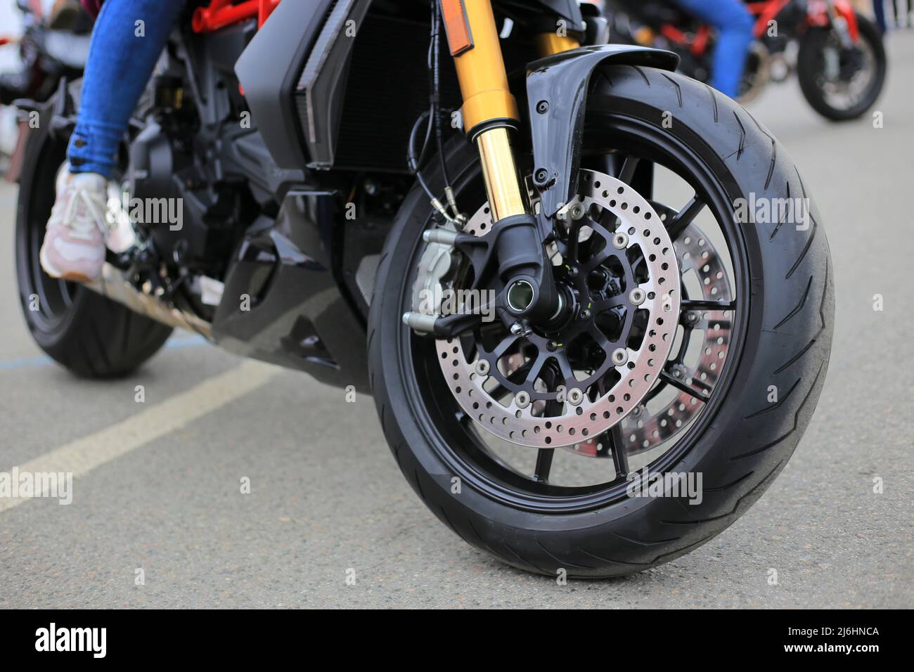 Front wheel of a modern motorcycle Stock Photo - Alamy