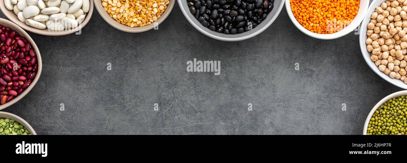 Banner of various types of legumes in bowls, green and yellow peas ...