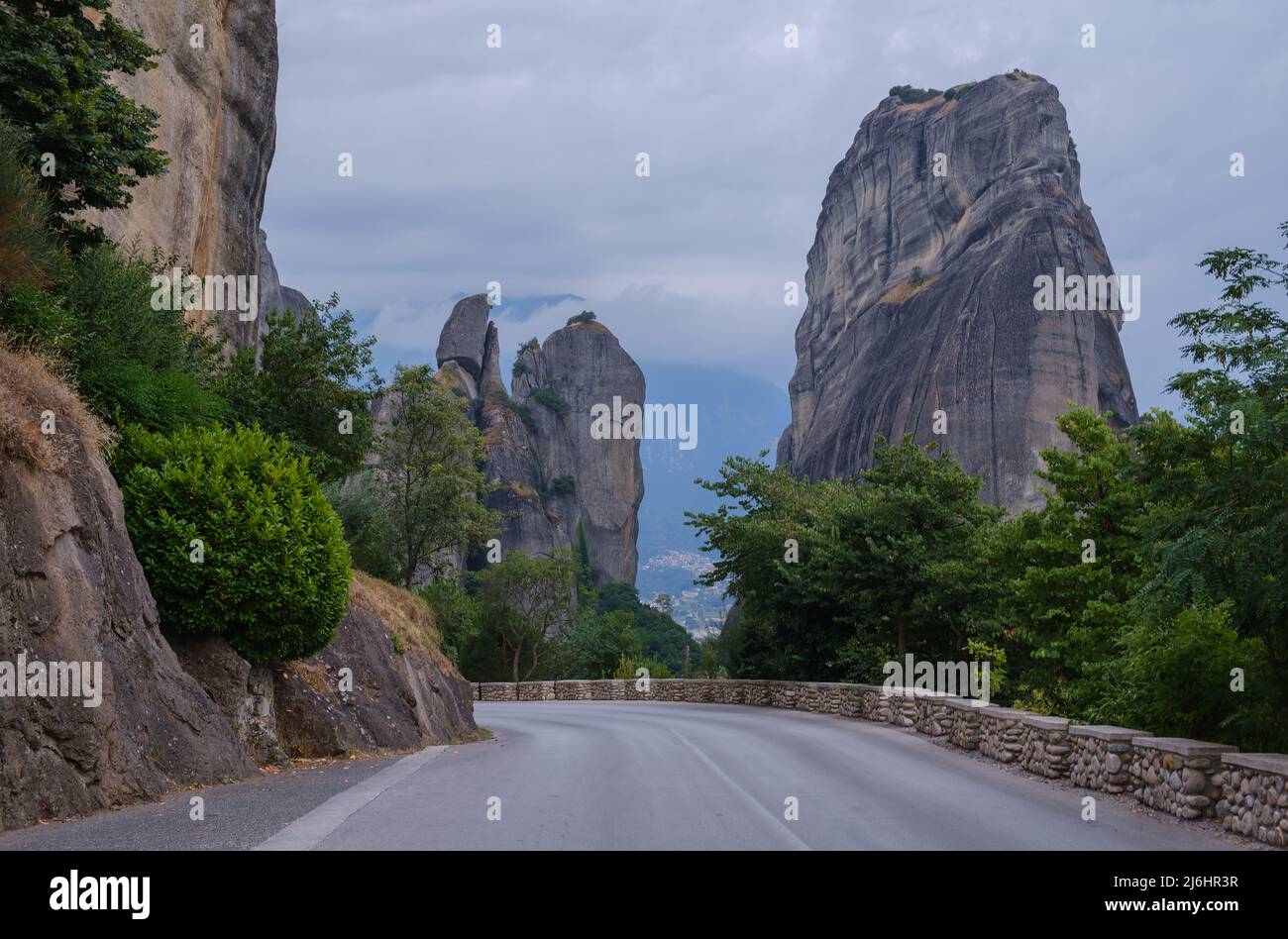 Scenic road to the towers of the Meteora conglomerate of Greece. Hiking ...