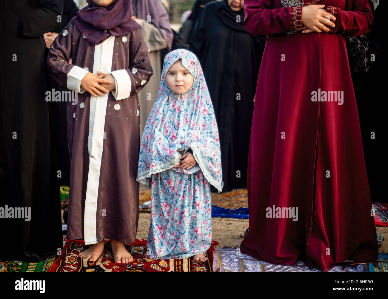 A Palestinian Muslim child performs the Eid al-Fitr prayer at sunrise ...