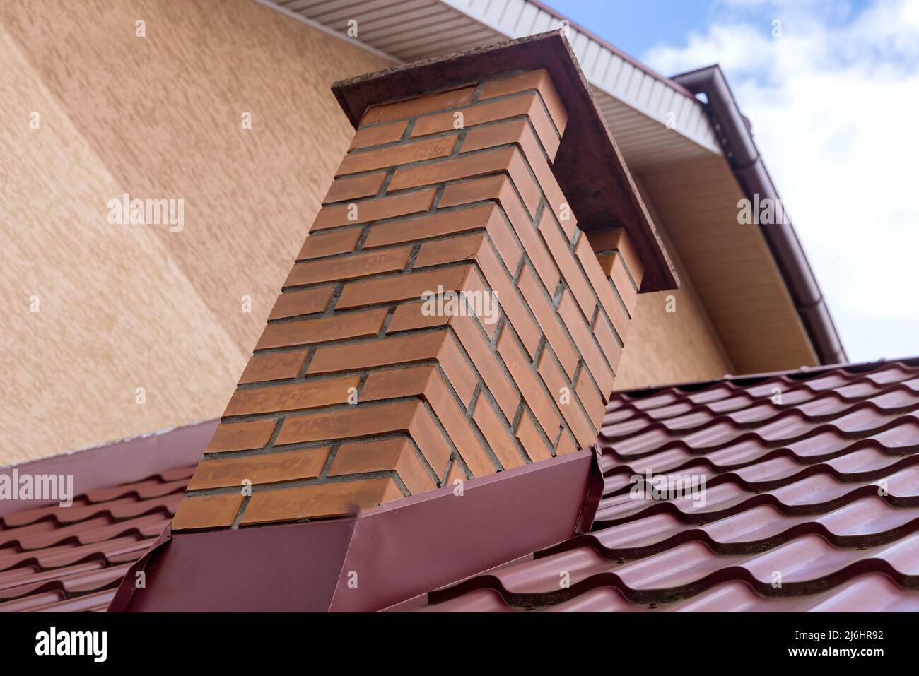 Red metal roof tiles shingles with roofing construction Stock Photo - Alamy