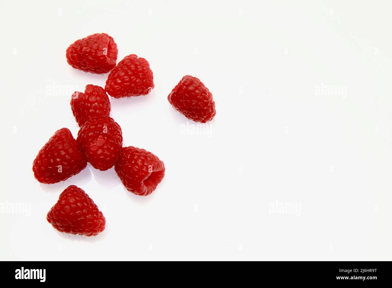 Raspberries on neutral background hi-res stock photography and images ...