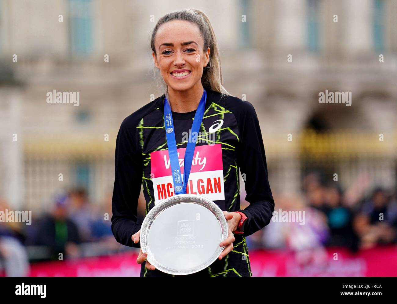 Eilish McColgan celebrates on the podium after winning the women's race ...