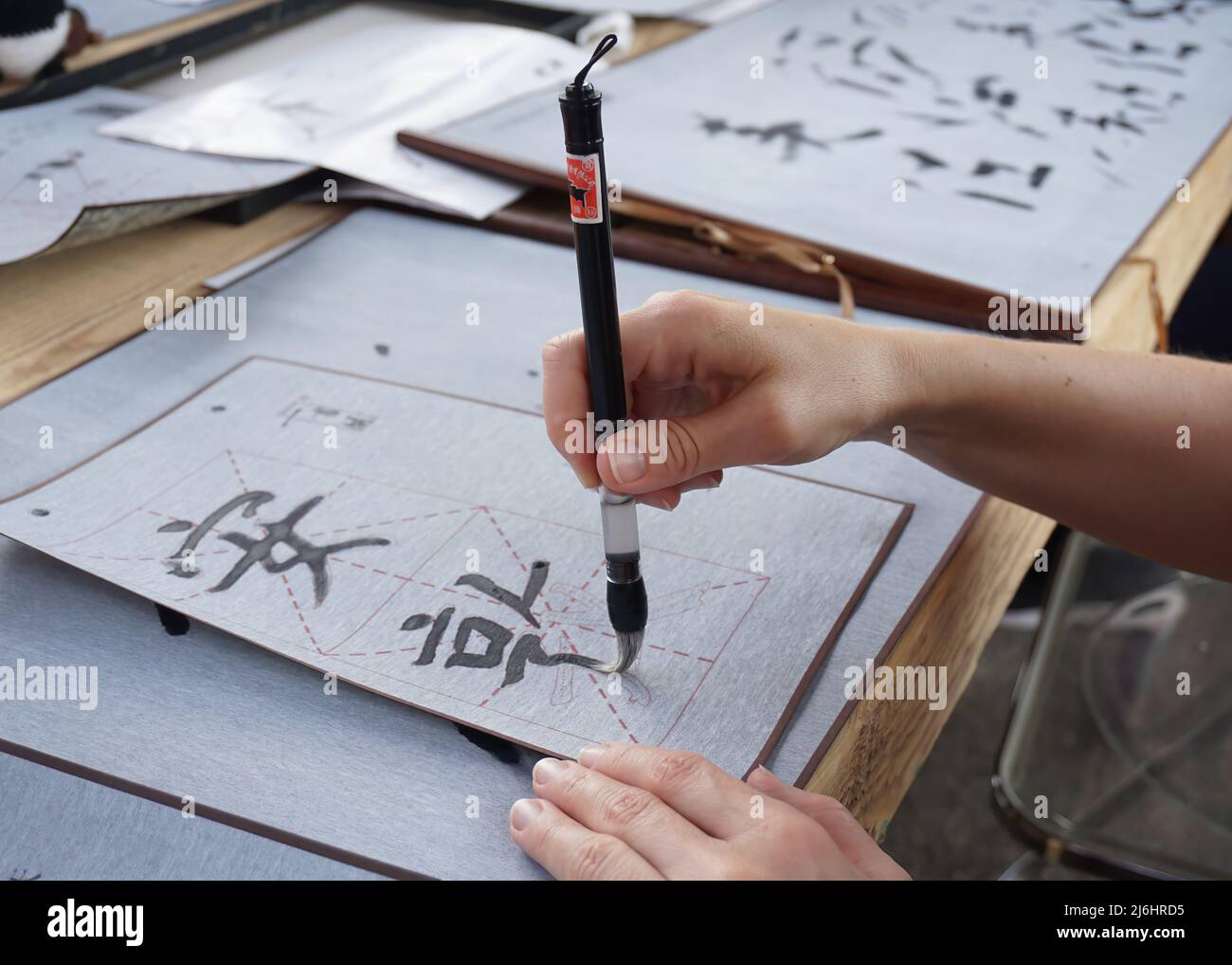 Learning calligraphy hi-res stock photography and images - Alamy