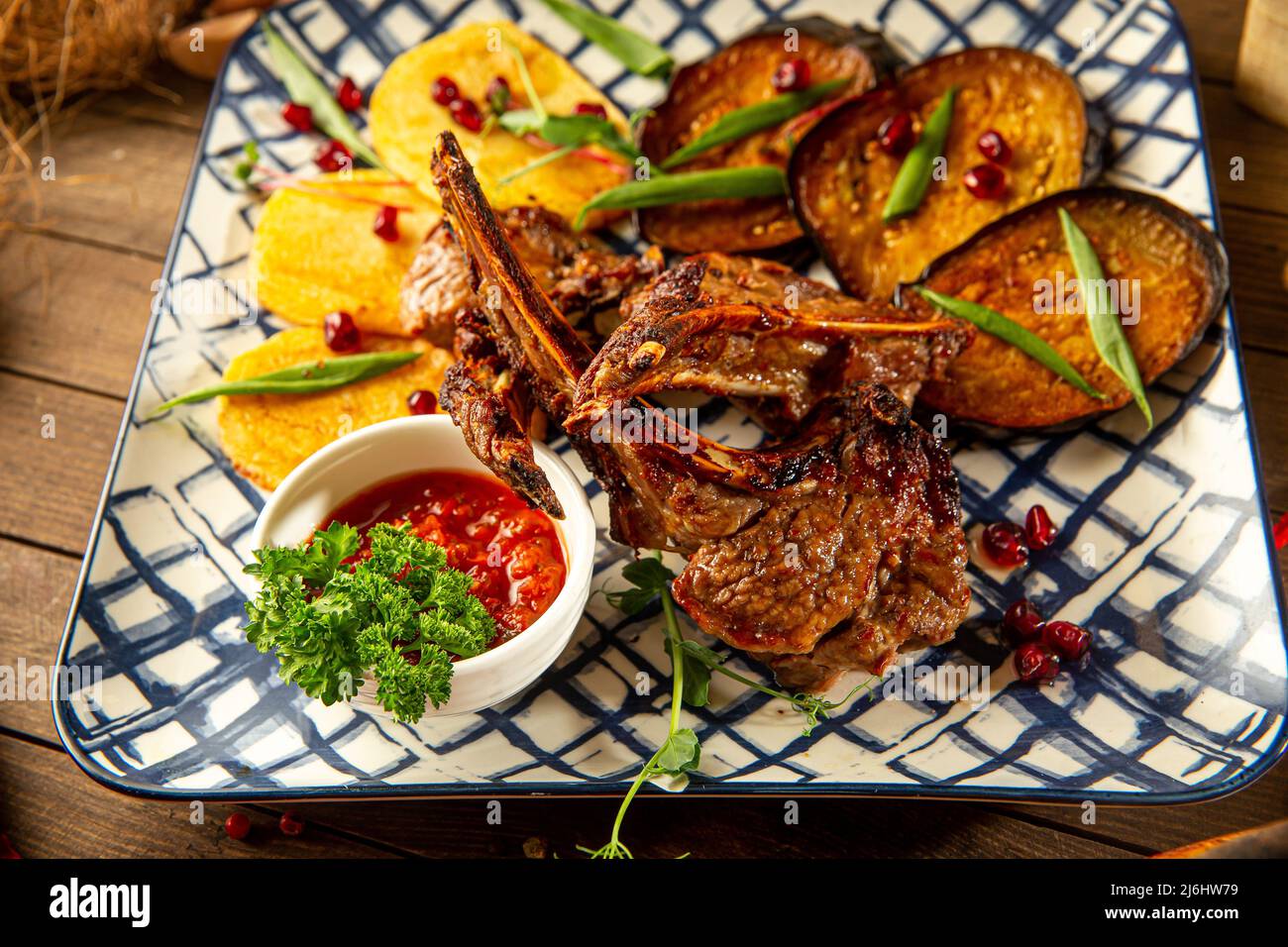 Closeup on lamb entrecote with eggplant Stock Photo - Alamy